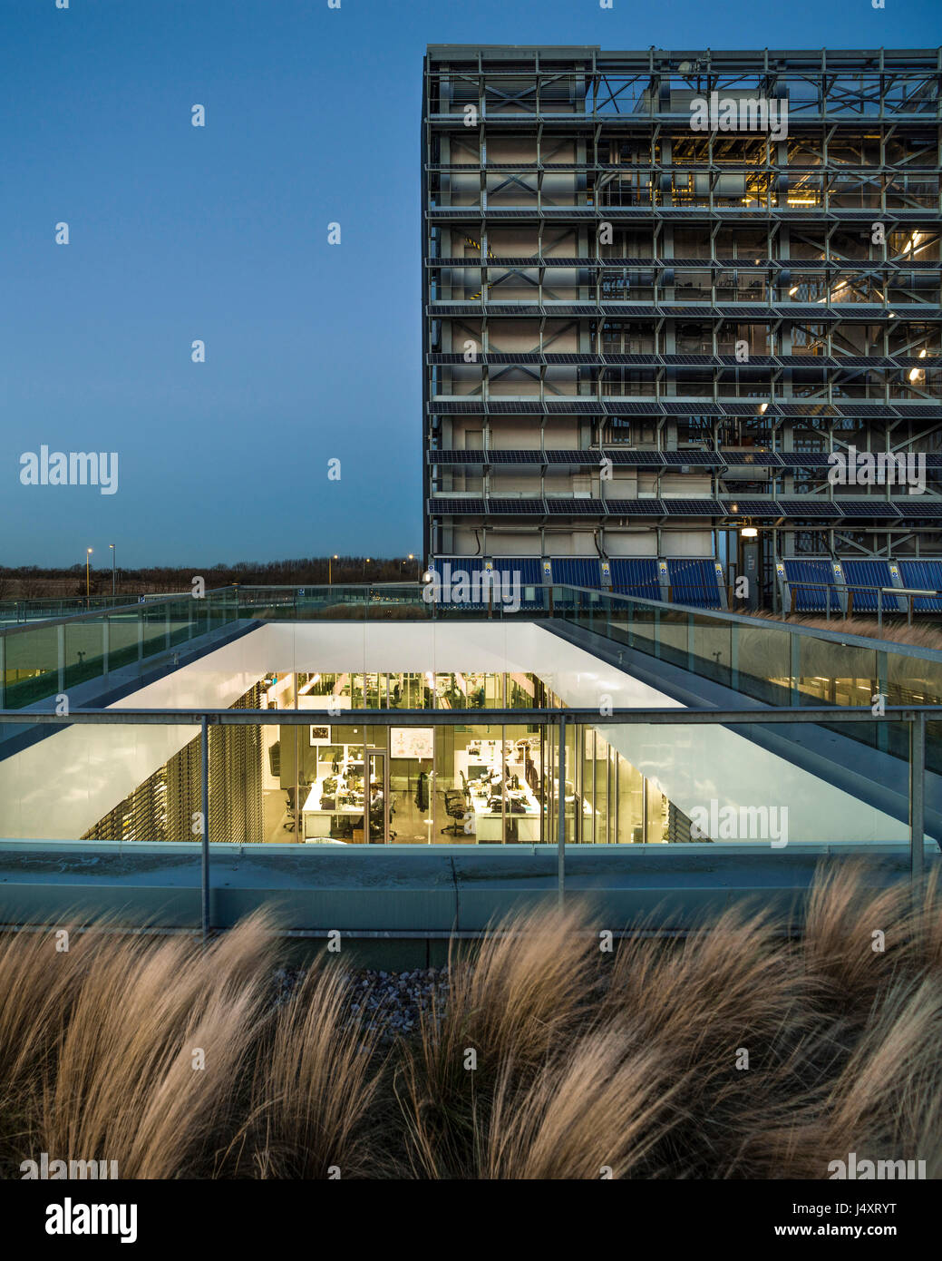 Internal courtyard light well with green roof and service tower. Gas ...