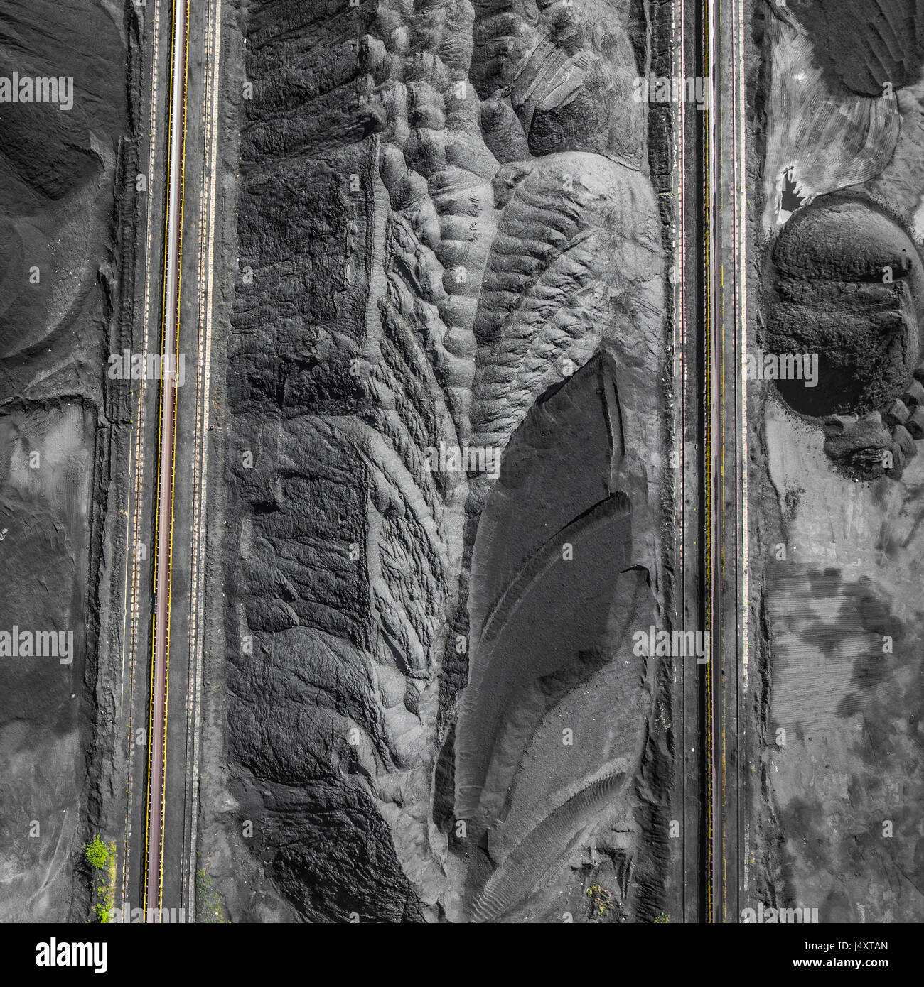 Black coal deposits. Exploration and machine. View from above Stock ...