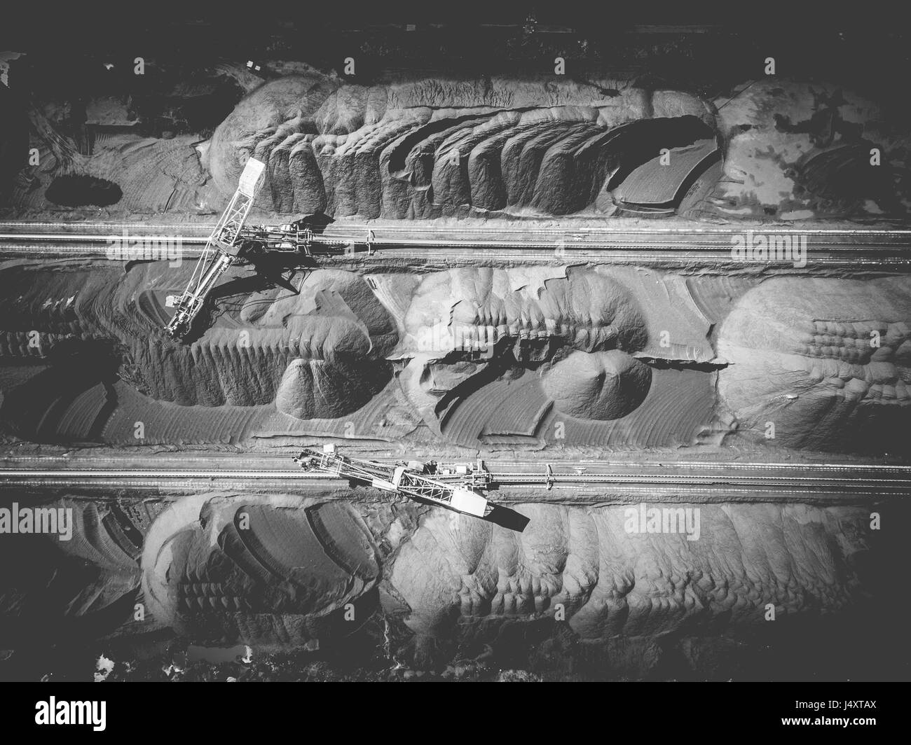 Black coal deposits. Exploration and machine. View from above Stock ...