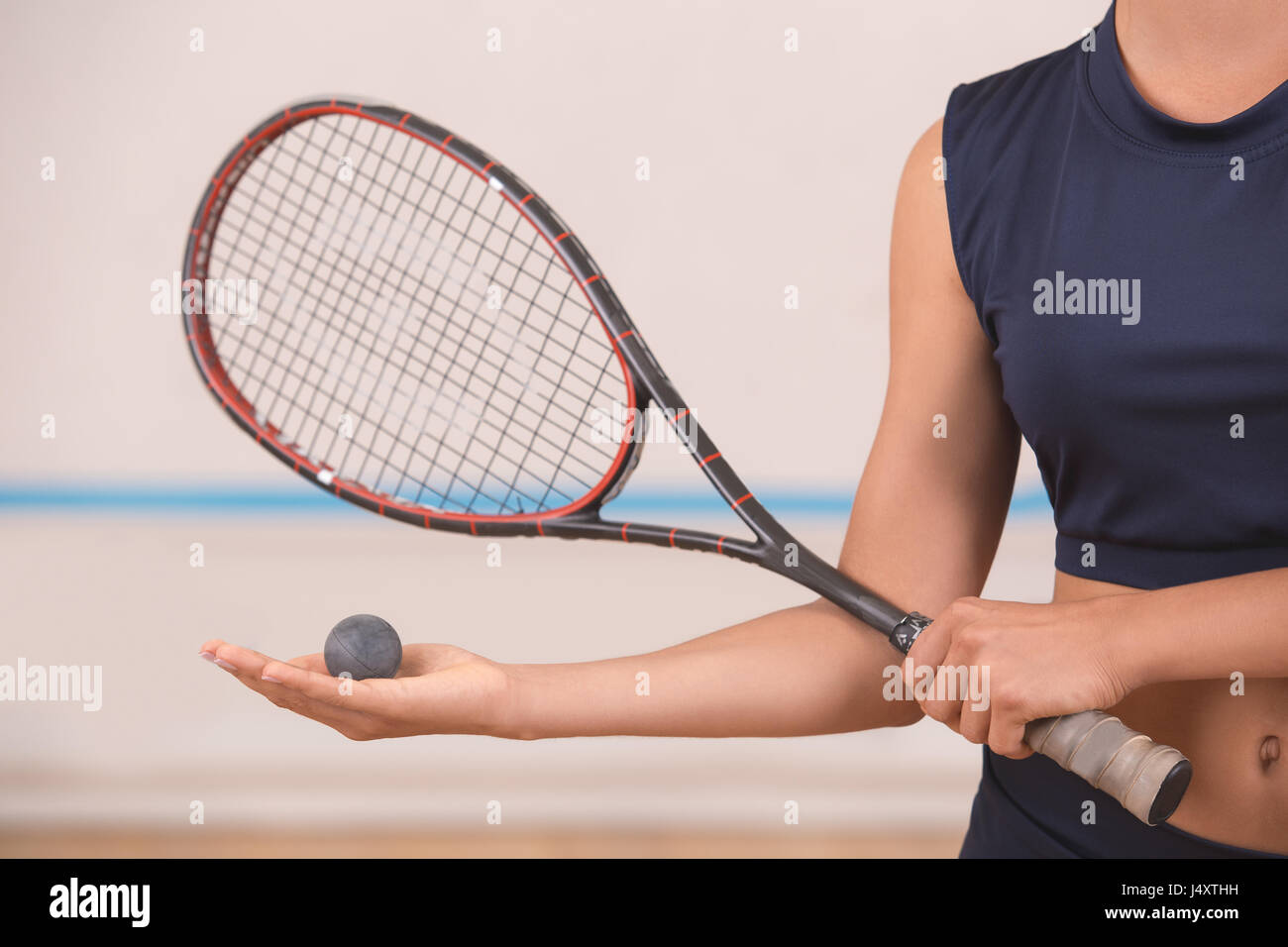 Young woman squash player exercise game in the gym Stock Photo - Alamy