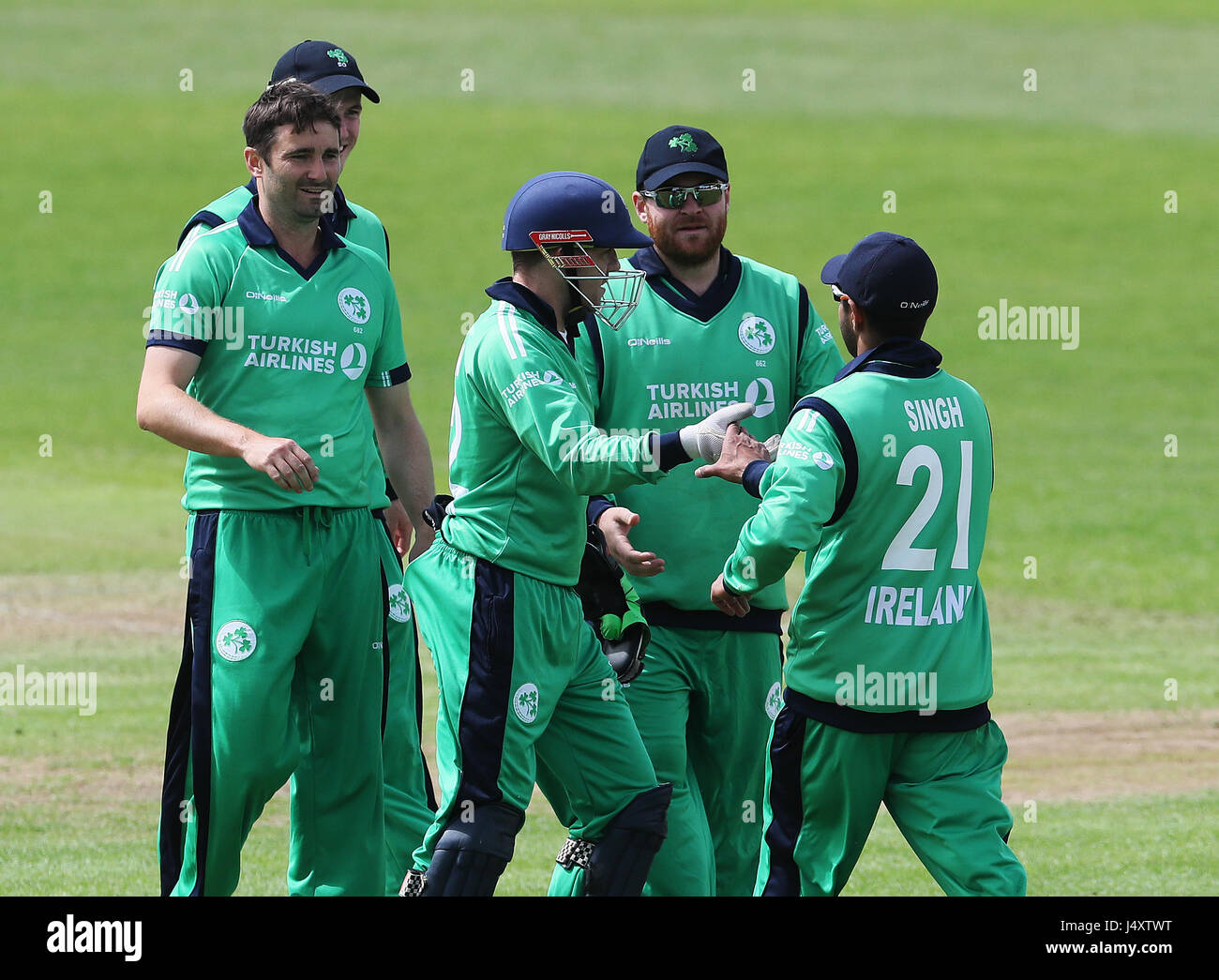 Ireland's Simi Singh (right) celebrates with team-mates after he caught ...