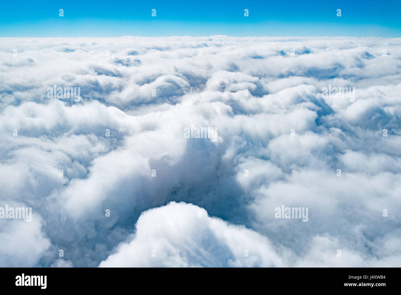 View of the white clouds from airplane window Stock Photo - Alamy