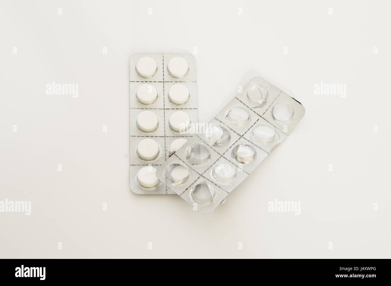 Medicine tablet strips, full and empty, isolated on white Stock Photo ...