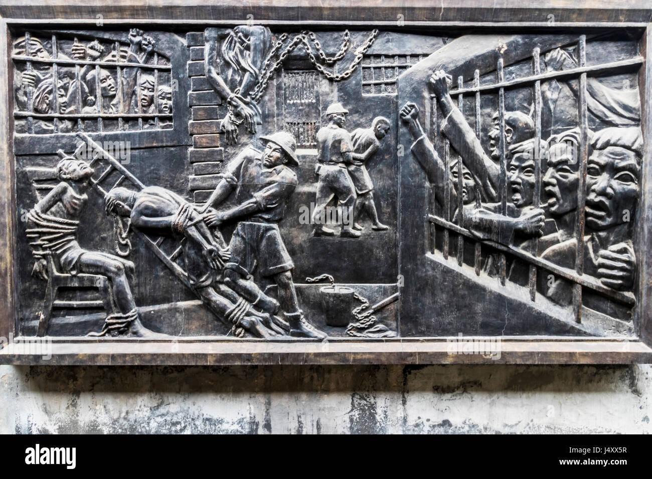 Plaque showing conditions and abuses during French Colonial times at ...