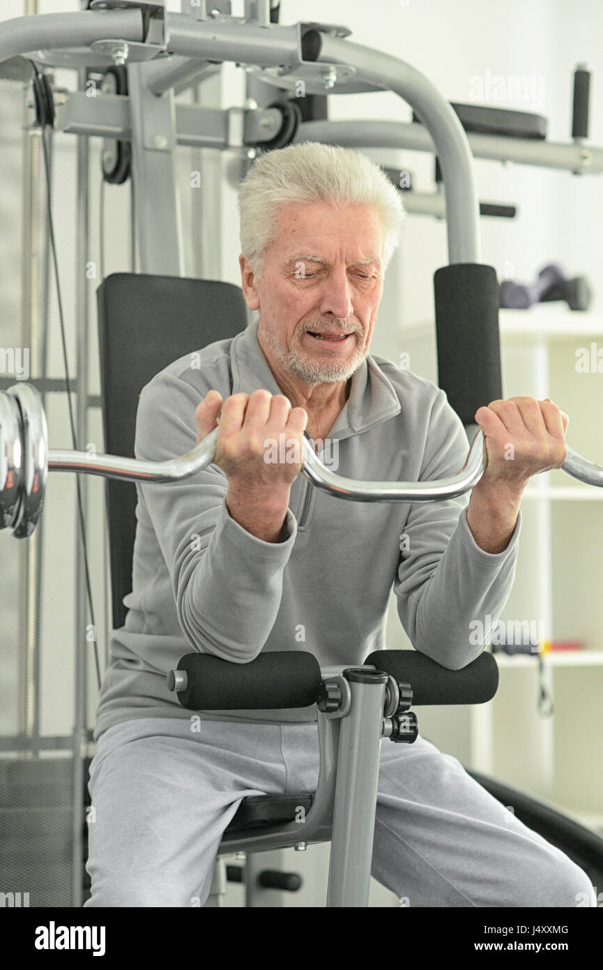 Elderly man in the gym Stock Photo - Alamy