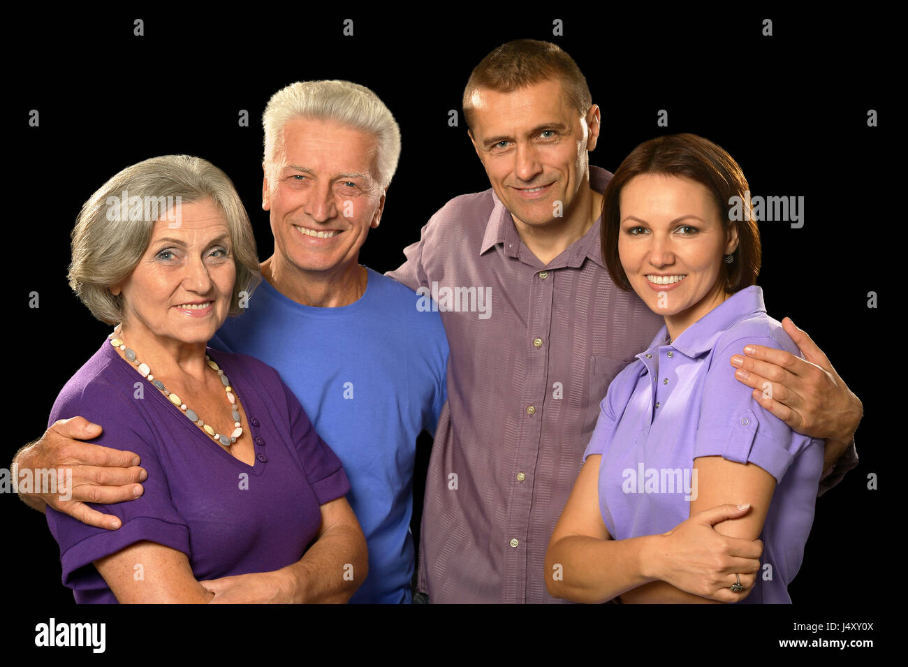 Happy parents with grown-up children Stock Photo - Alamy