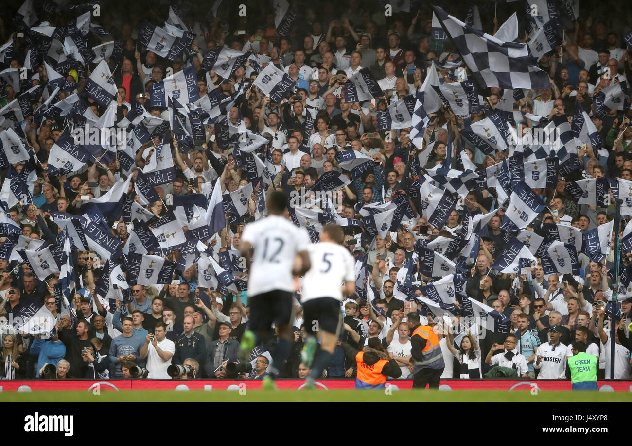 Tottenham fans wave flags during the Premier League match at White Hart ...