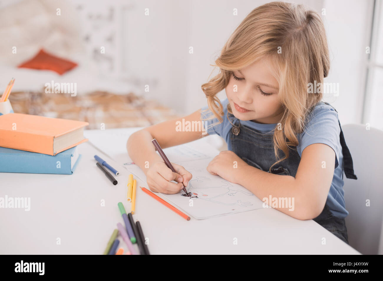 Little kid girl drawing at home creativity development Stock Photo - Alamy