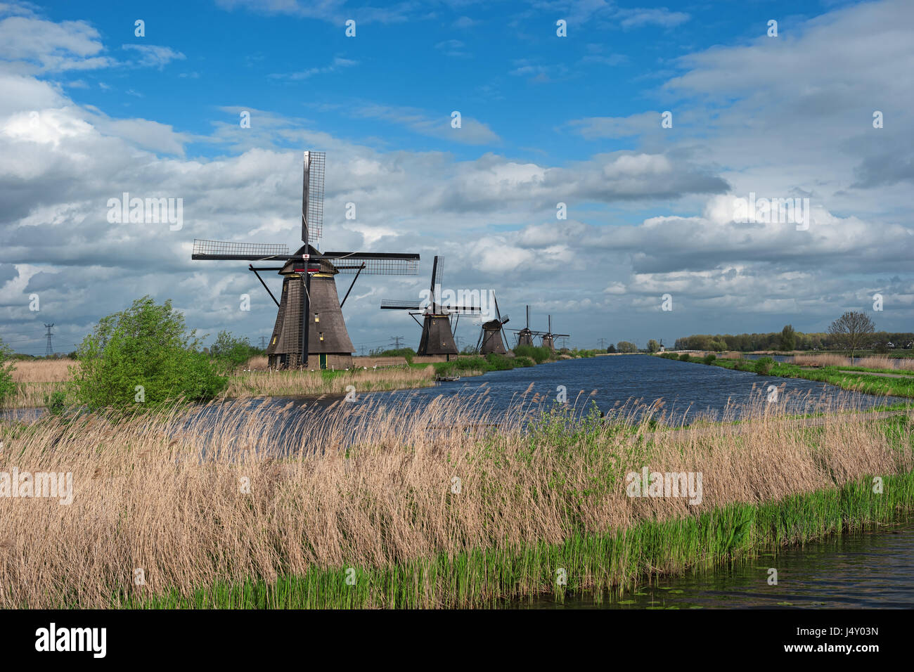 Traditional dutch windmills and water canal, Kinderdijk, Netherlands ...