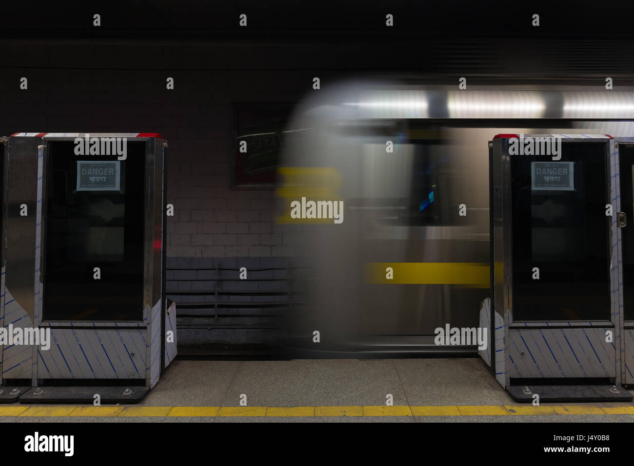 The new metro train running underground in Delhi, India. Motion blur ...