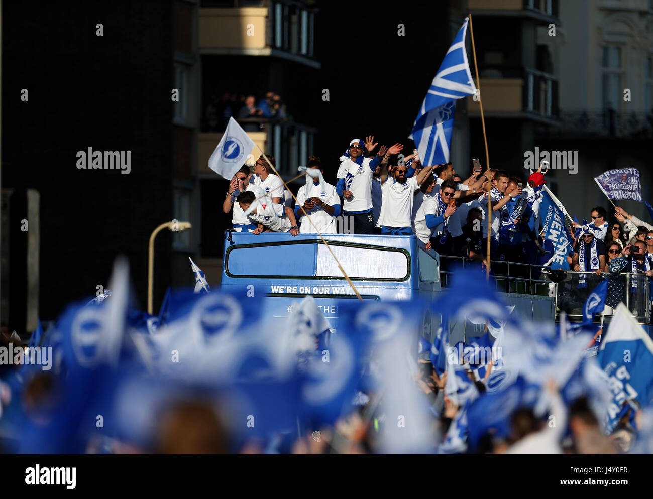 Brighton and Hove Albion players celebrate during the bus parade ...