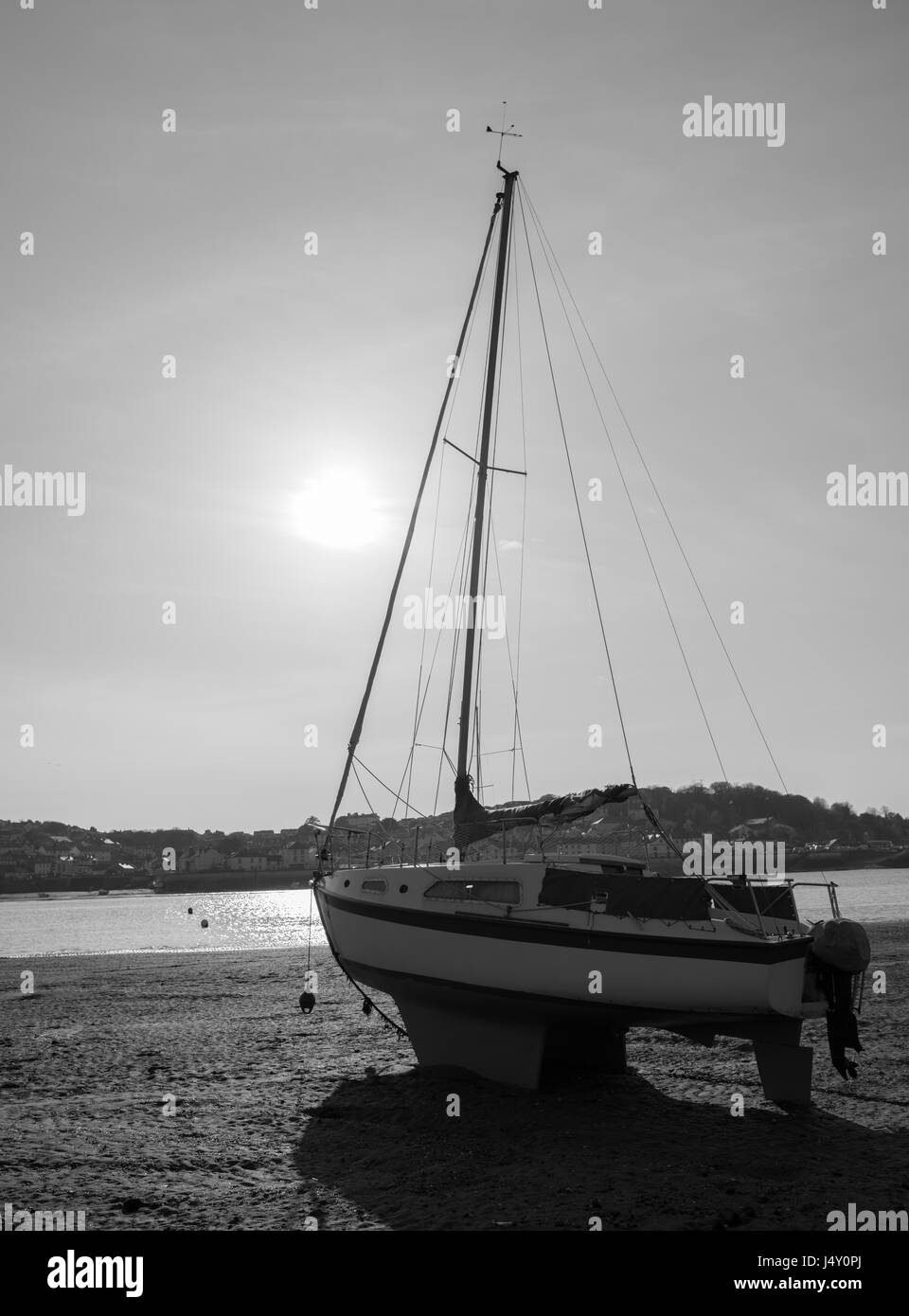 sunsetting over a boat Stock Photo - Alamy