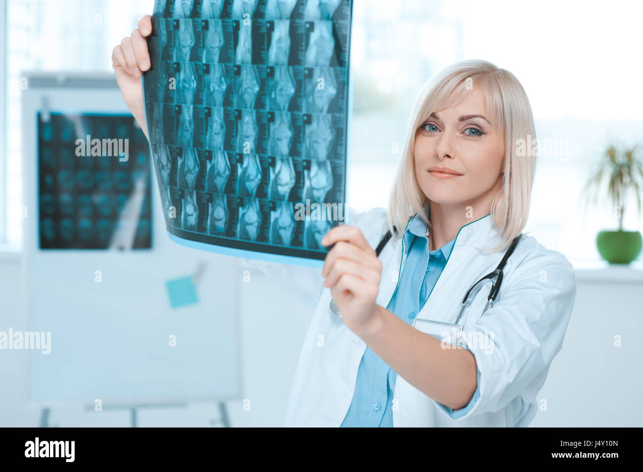 Young woman doctor occupation in the hospital office Stock Photo - Alamy
