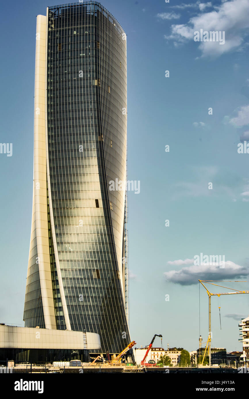 a view of a curved skyscraper in Milan city Stock Photo - Alamy
