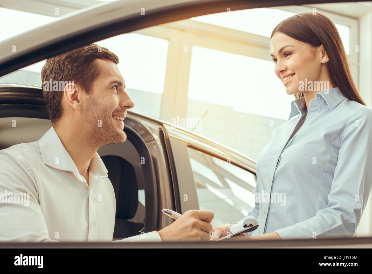 Young Man in a Car Rental Service Test Drive Concept Stock Photo - Alamy