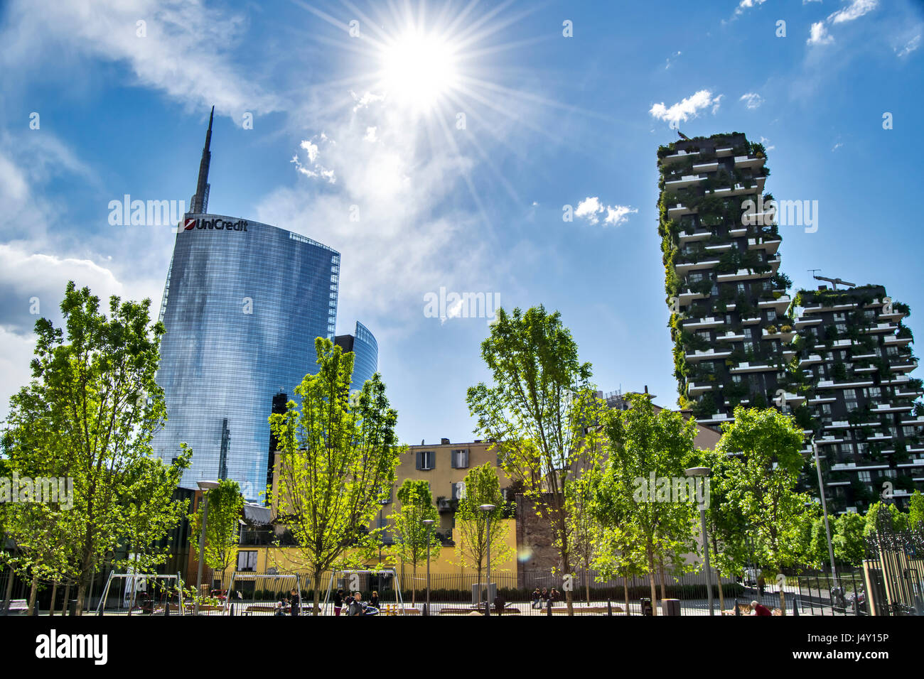 a back light photography of milan city scape, including unicredit tower ...
