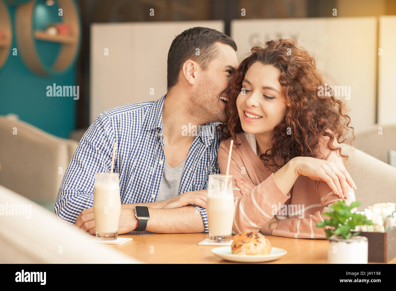 Nice looking couple in cafe Stock Photo - Alamy