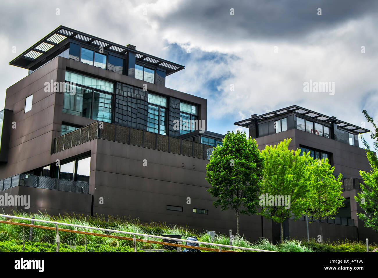 modern private houses in Milan downtown, with large windows and a ...