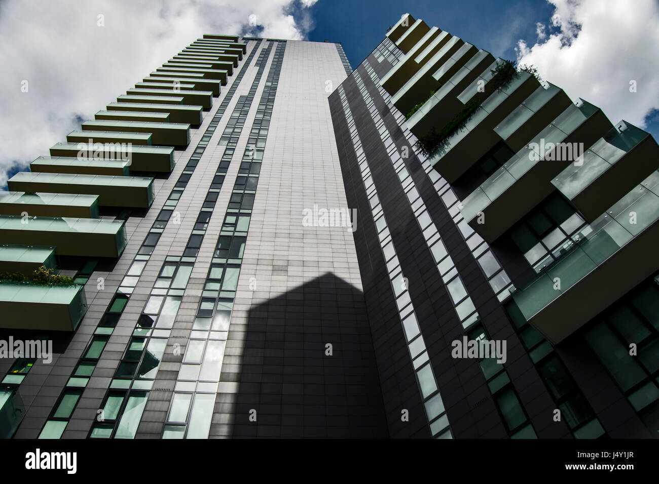 a view from below of a modern residential building in Milan city Stock ...