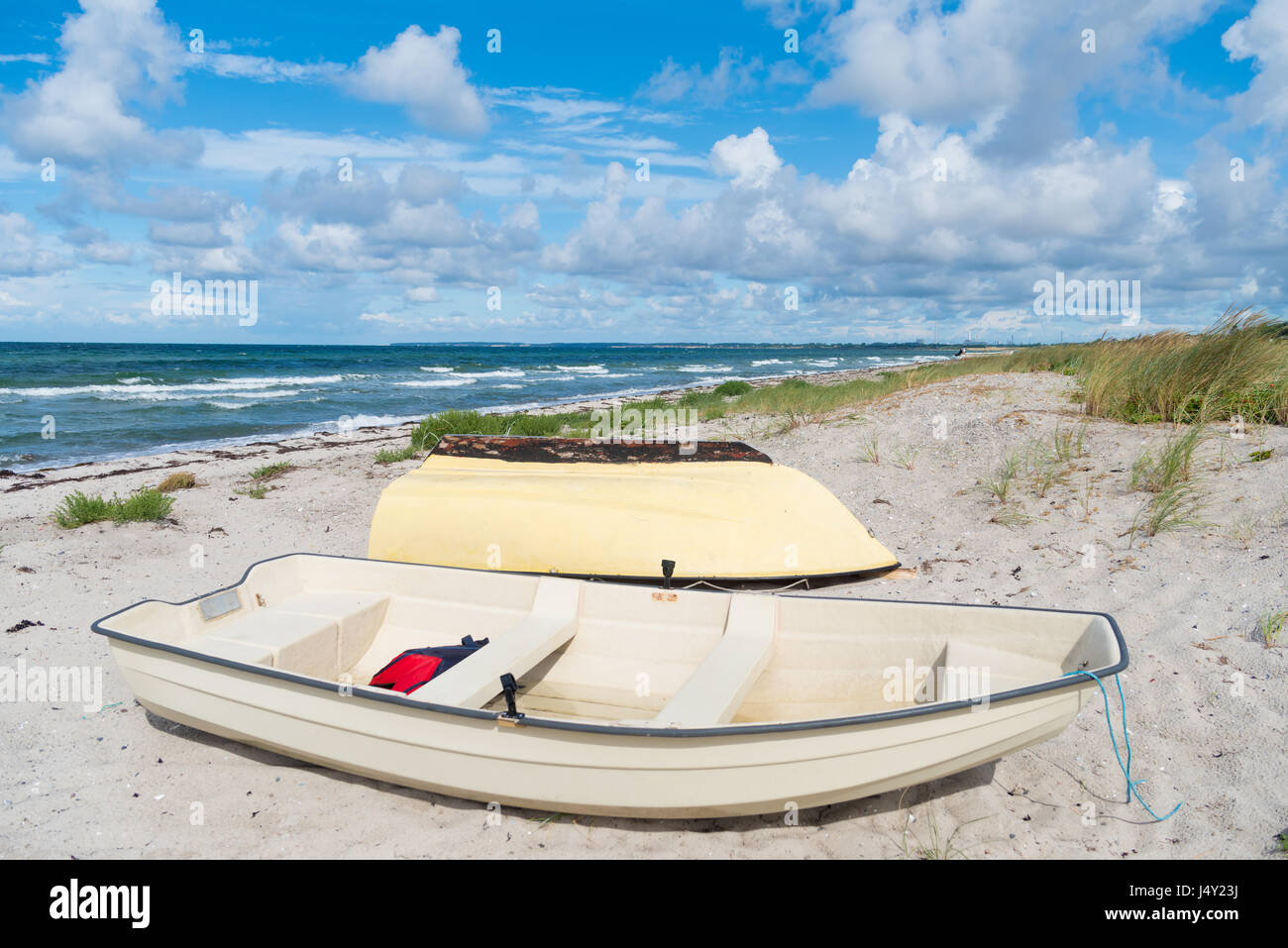 small fishing boats on a danish beach Stock Photo - Alamy