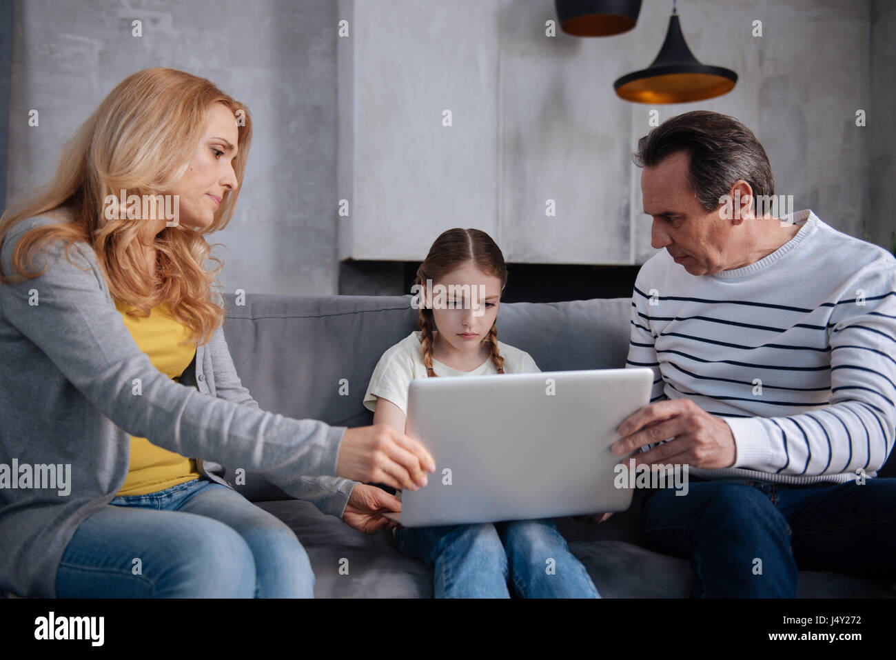 Child taking away laptop hi-res stock photography and images - Alamy