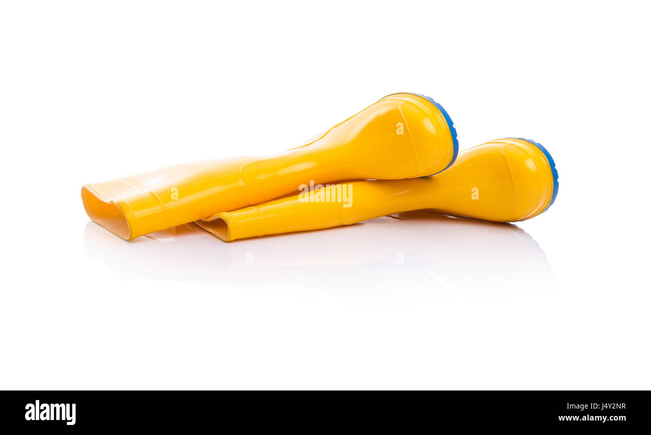 Yellow rubber boots. Isolated on white background Stock Photo - Alamy