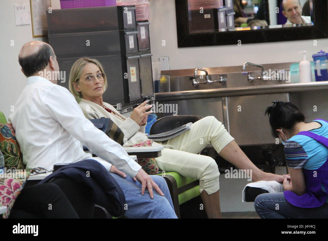 Sharon Stone gets her nails done and then returns to her car Featuring ...