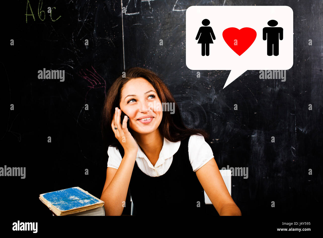 portrait of happy cute student in classroom at blackboard back t Stock ...
