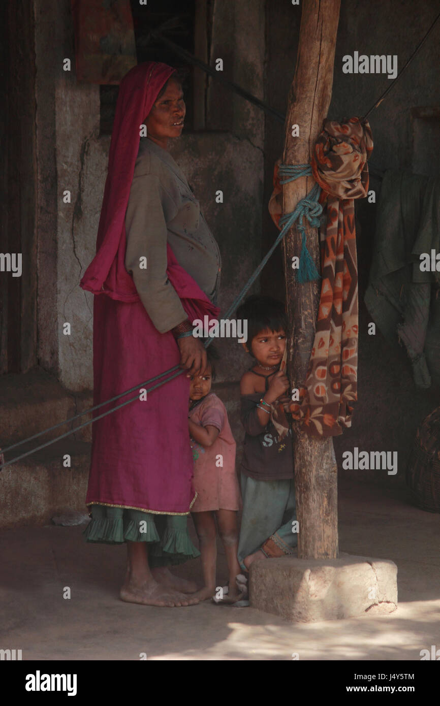 Mother with two children, Kawant Festival, Gujarat, India Stock Photo ...