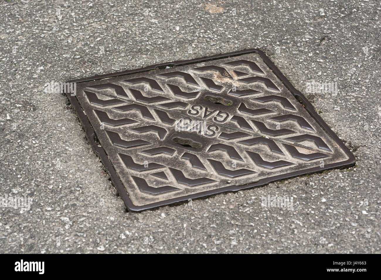 Road cover for UK domestic gas supply to a property Stock Photo - Alamy