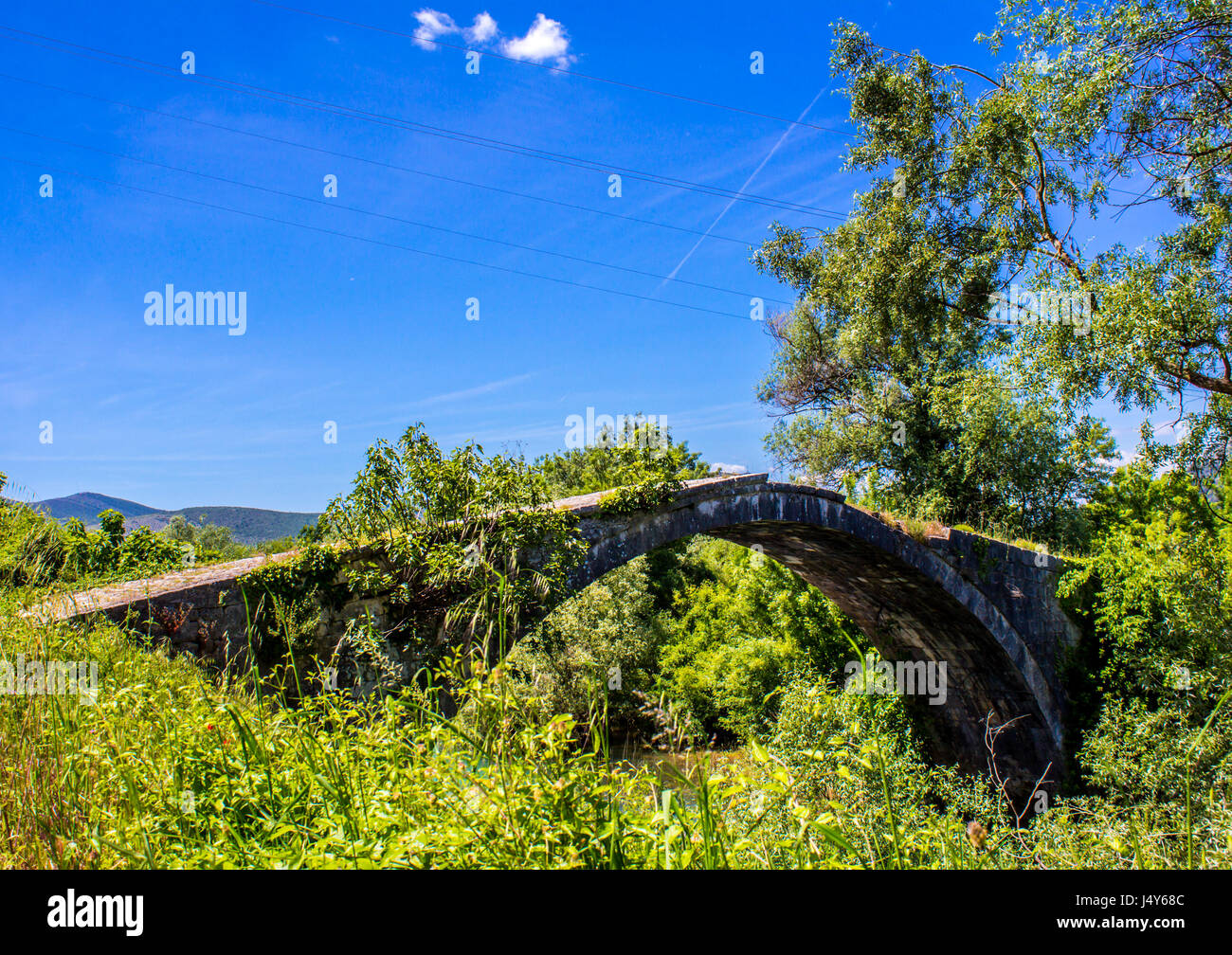 Bridge across a small river hi-res stock photography and images - Alamy