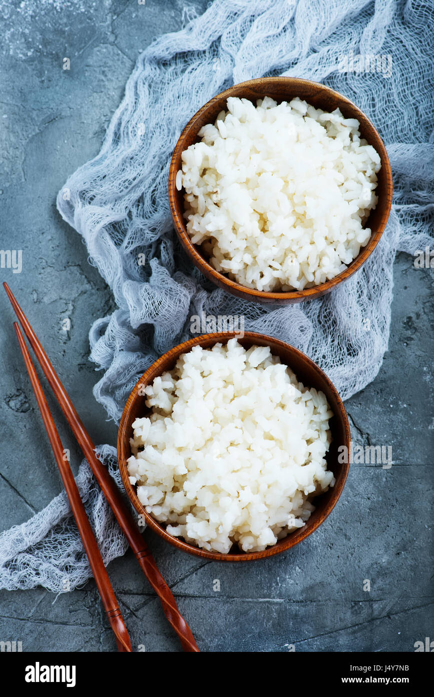 boiled rice in bowl and on a table Stock Photo - Alamy