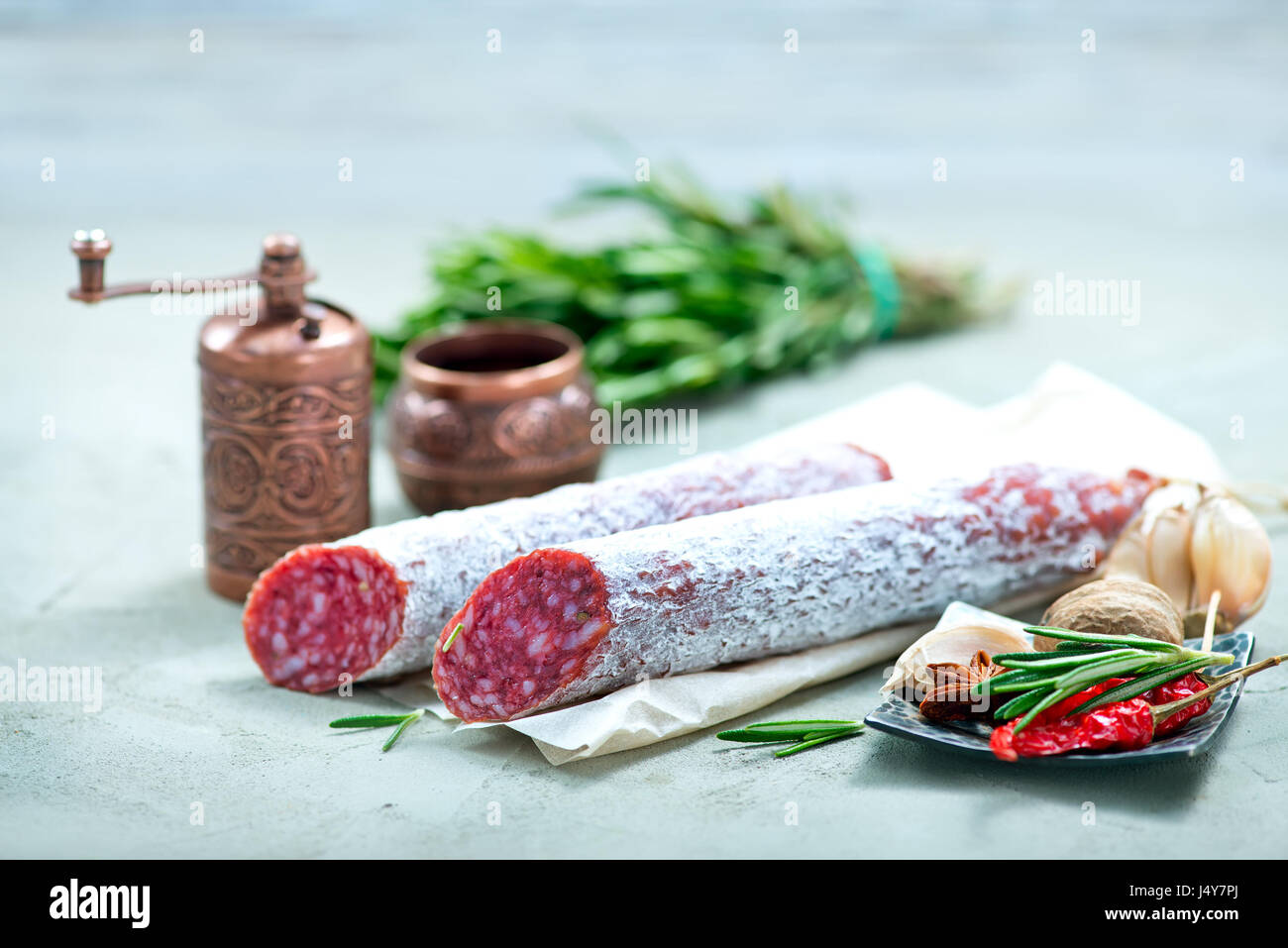 salami with aroma spice on a table Stock Photo - Alamy