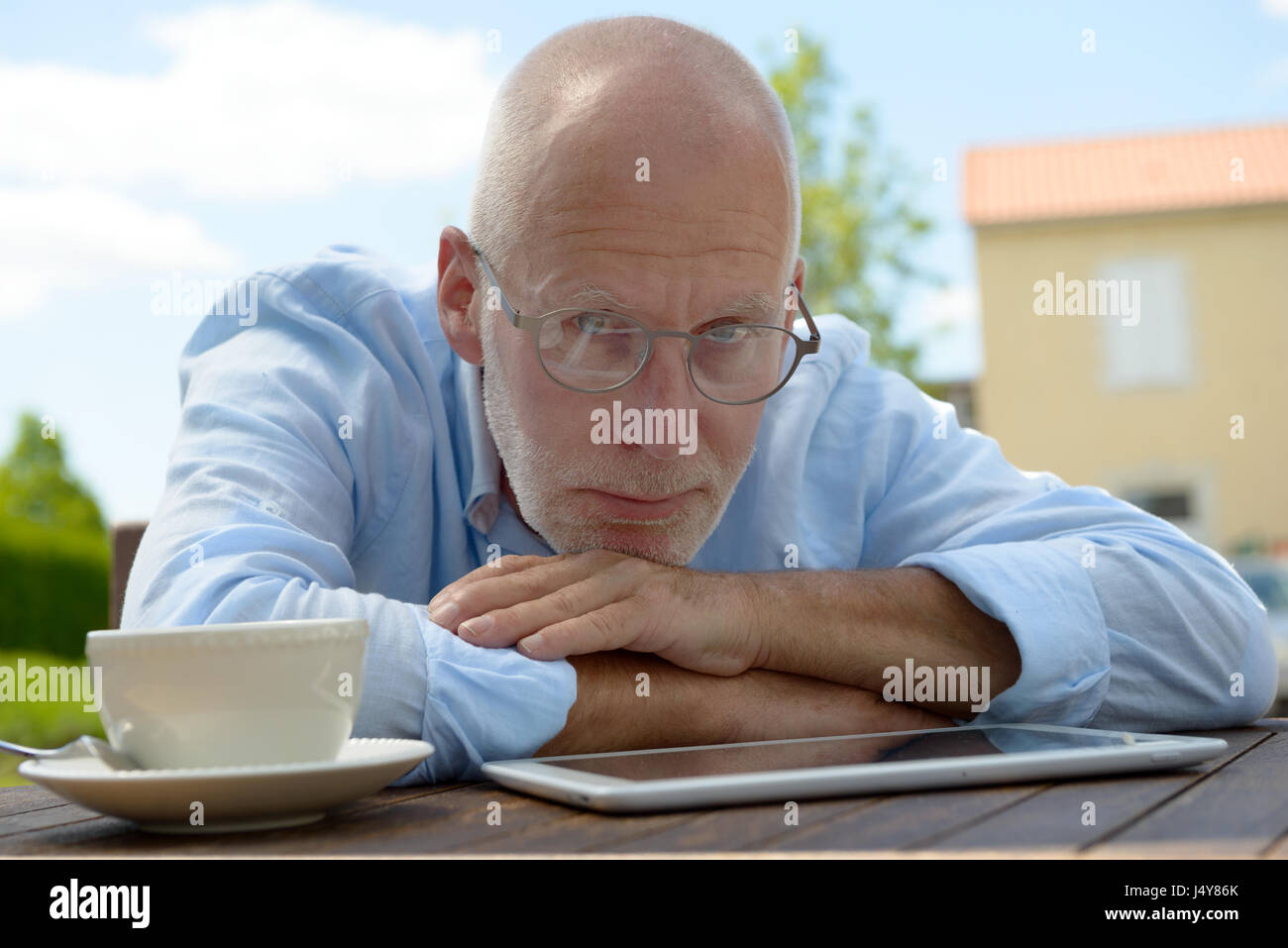 portrait of an angry senior man outdoor Stock Photo - Alamy
