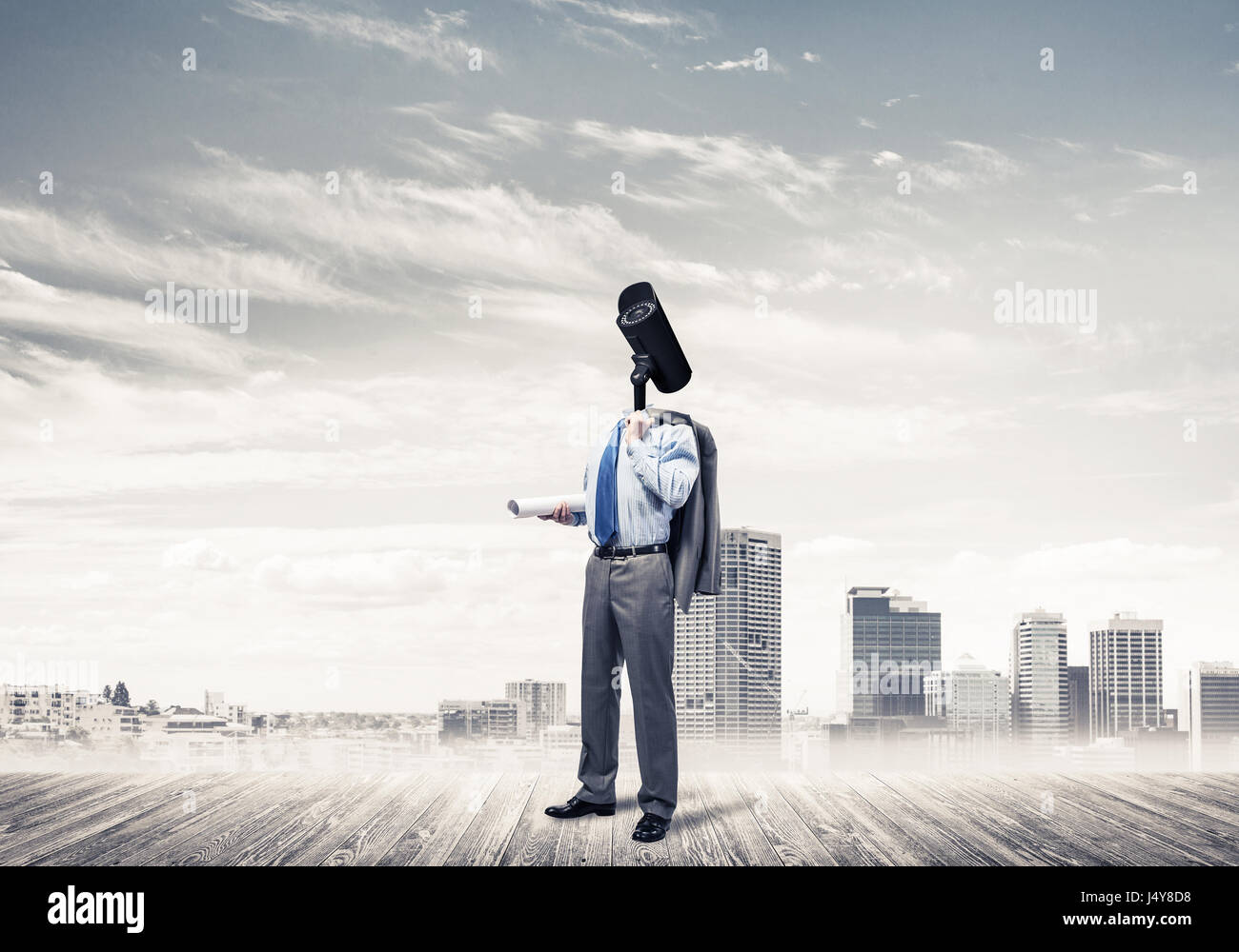 Camera headed man standing on wooden floor against modern citysc Stock ...