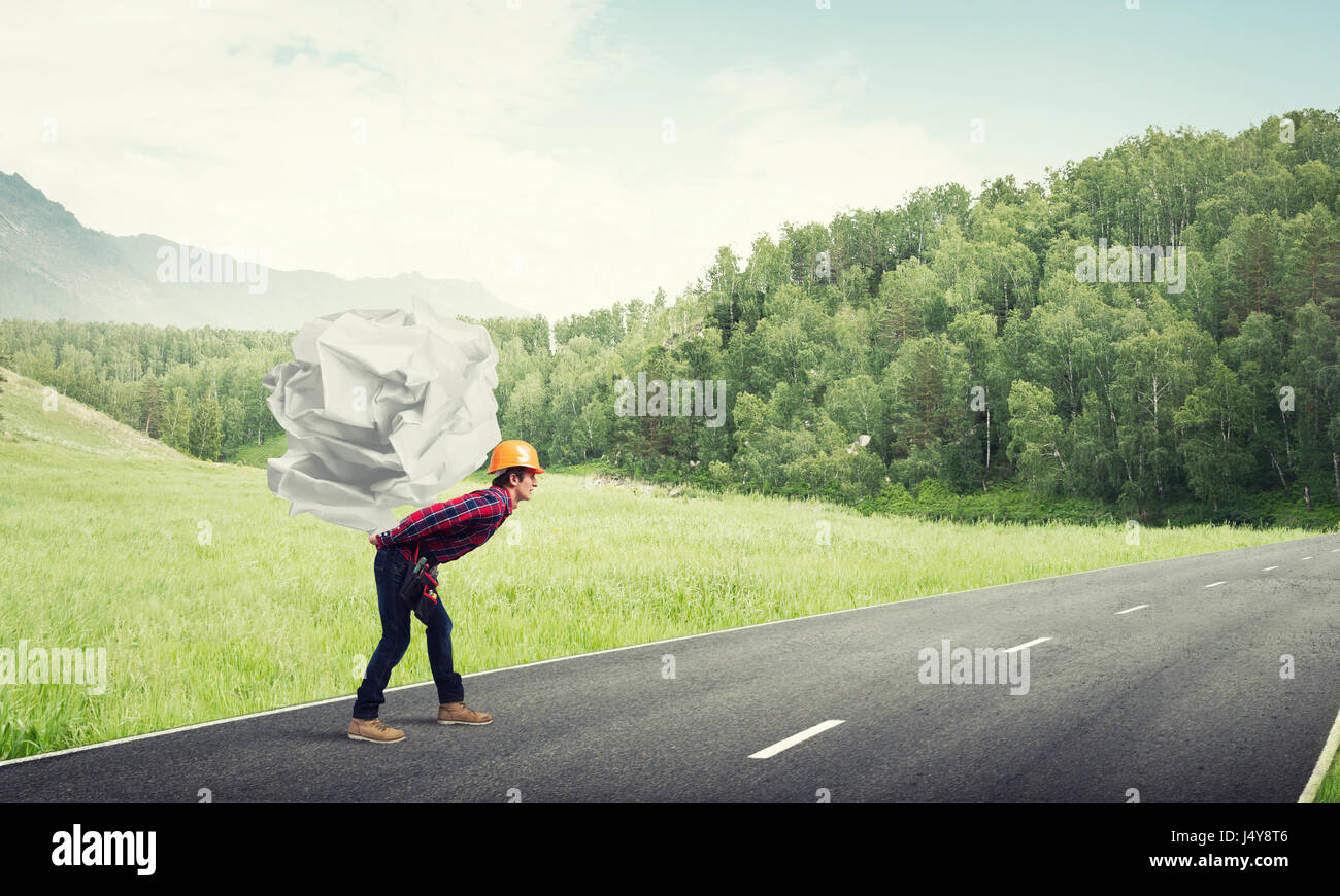 Engineer man carry load Stock Photo - Alamy
