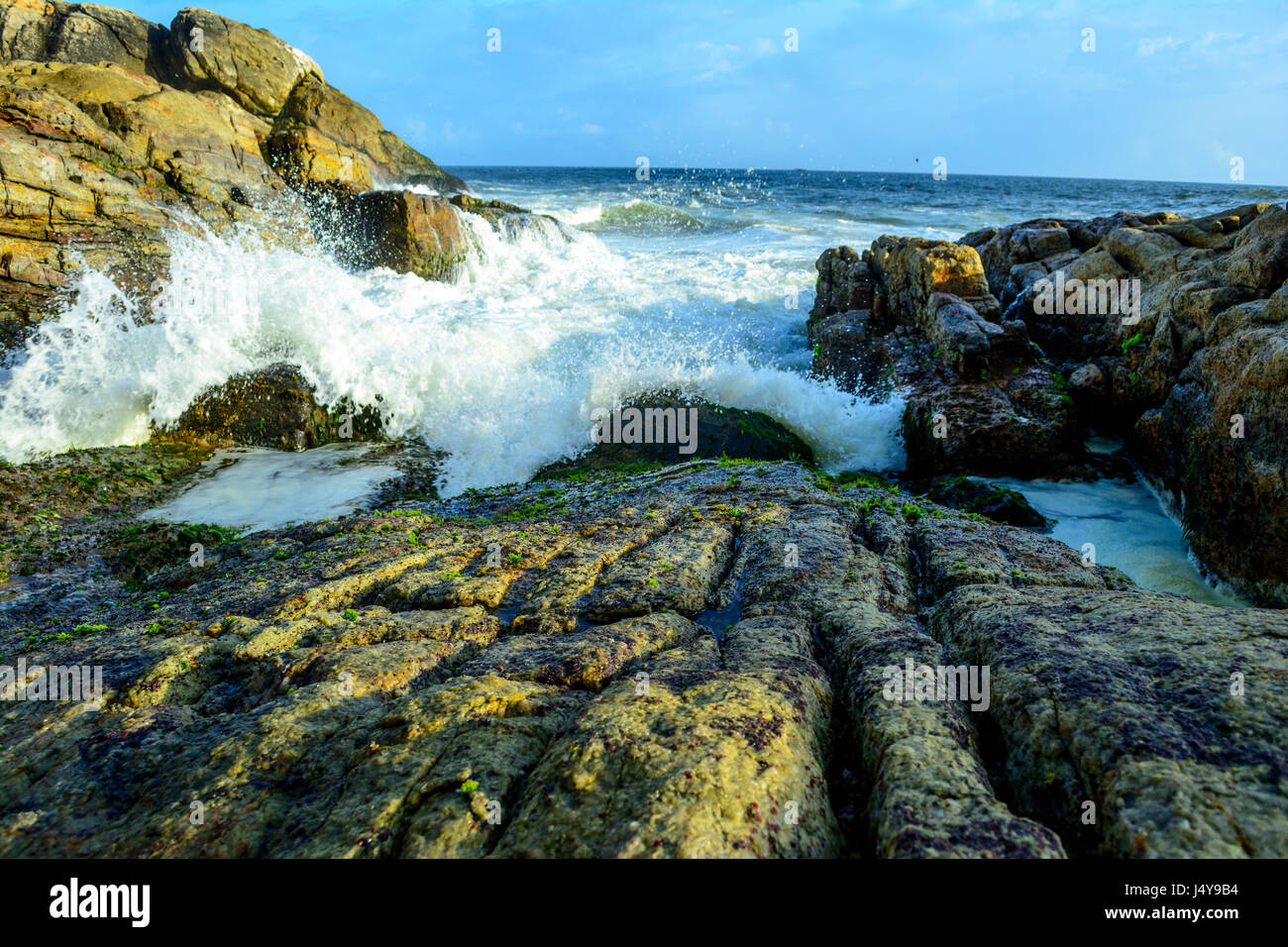 waves washing over Rocks Kerala Indian ocean Stock Photo - Alamy