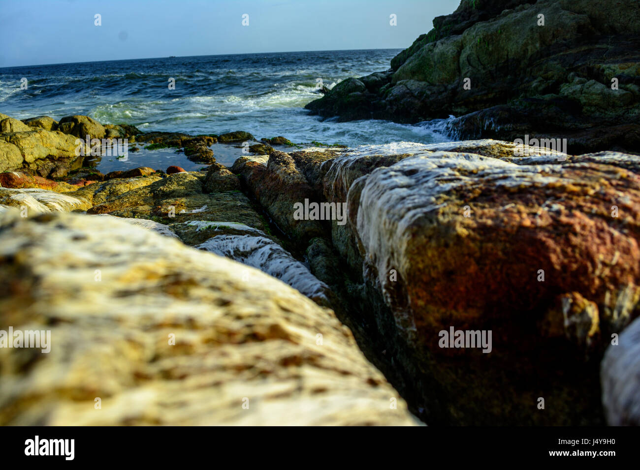 waves washing over Rocks Kerala Indian ocean Stock Photo - Alamy