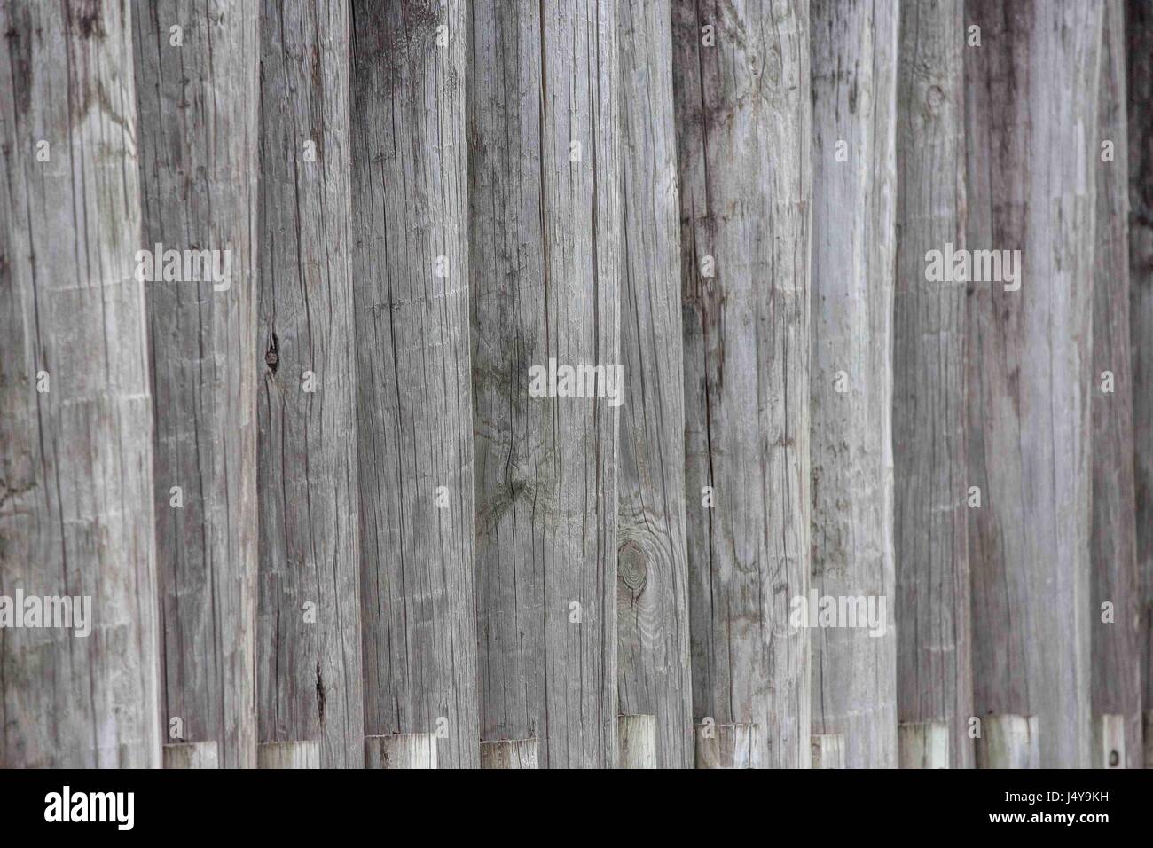 Vertical Gray Wood Poles Spaced Tightly Stock Photo - Alamy