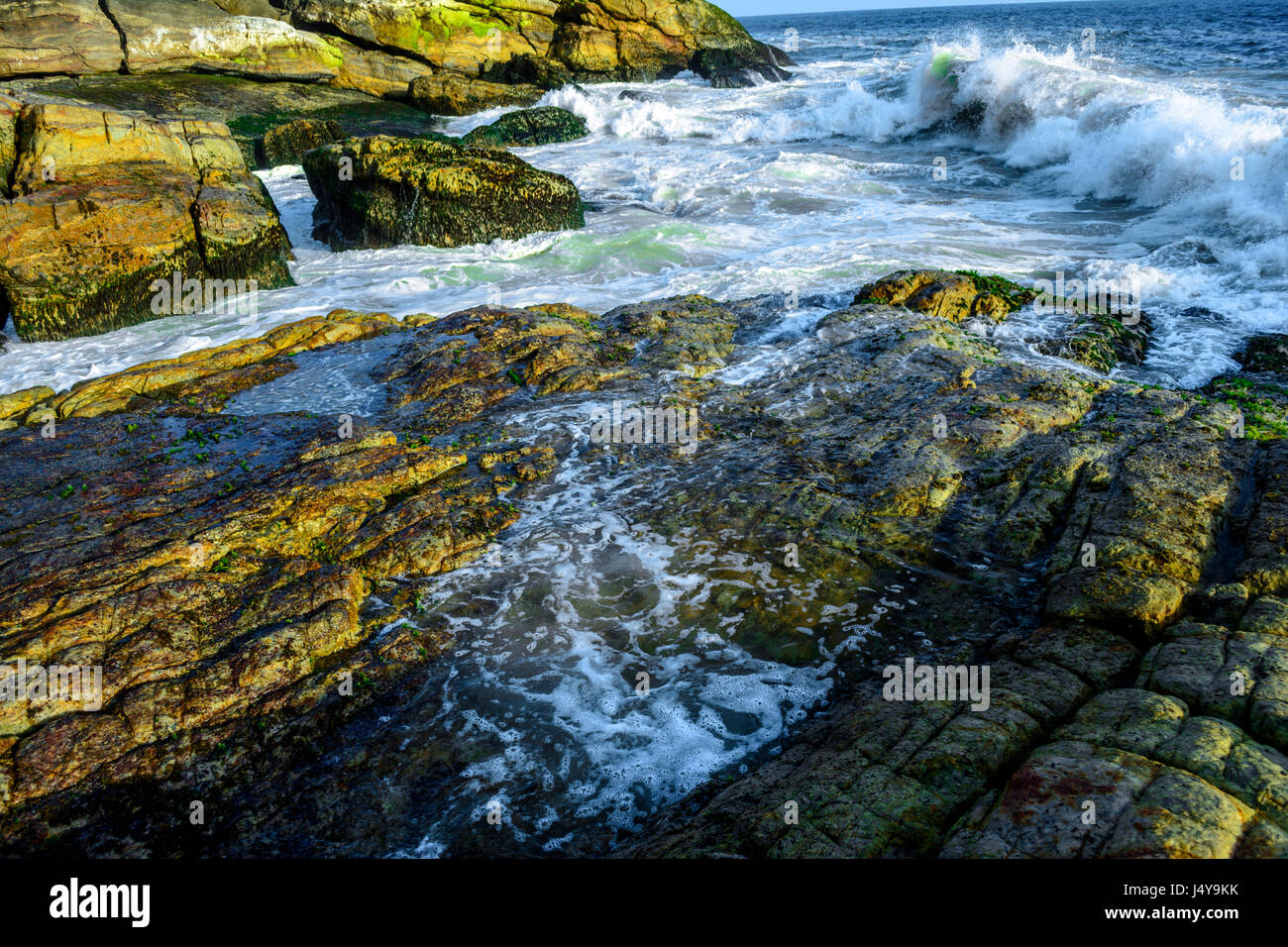 waves washing over Rocks Kerala Indian ocean Stock Photo - Alamy