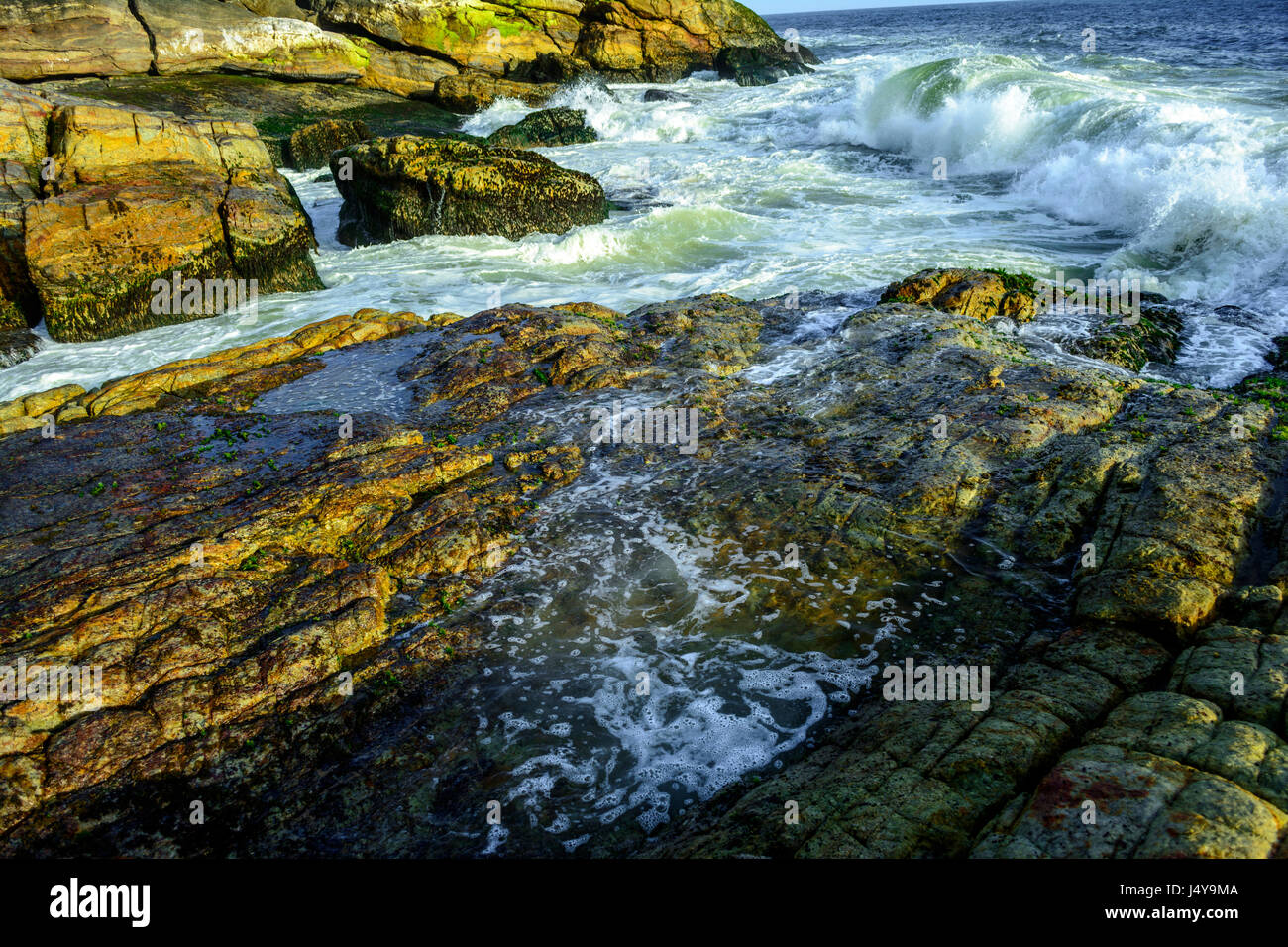 waves washing over Rocks Kerala Indian ocean Stock Photo - Alamy