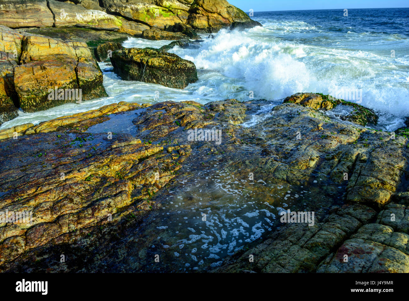 waves washing over Rocks Kerala Indian ocean Stock Photo - Alamy