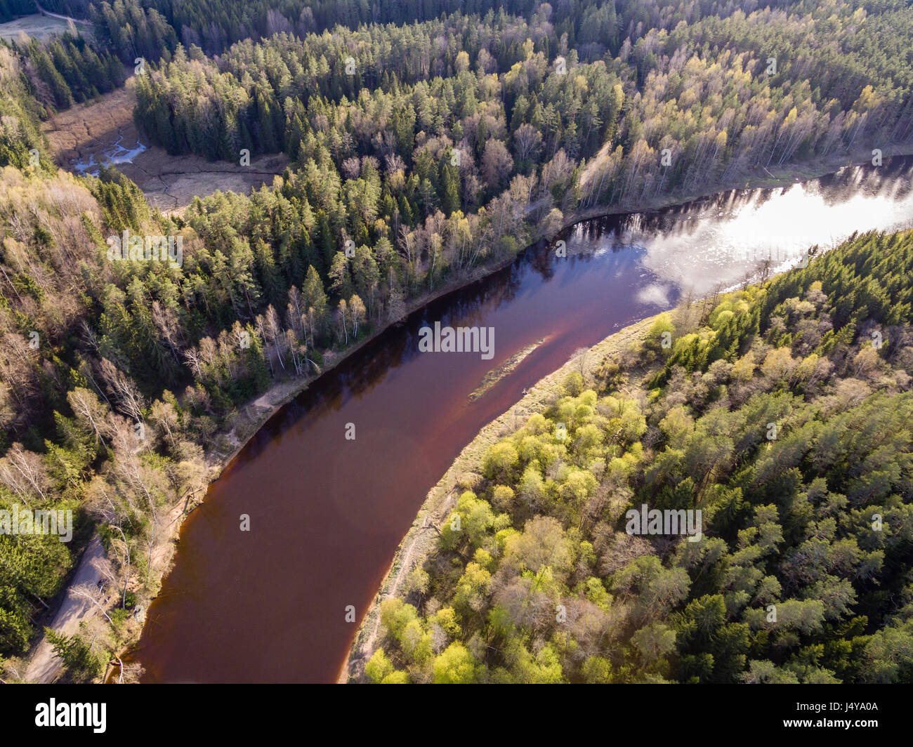 drone image. aerial view of rural area with river and broken cloud ...