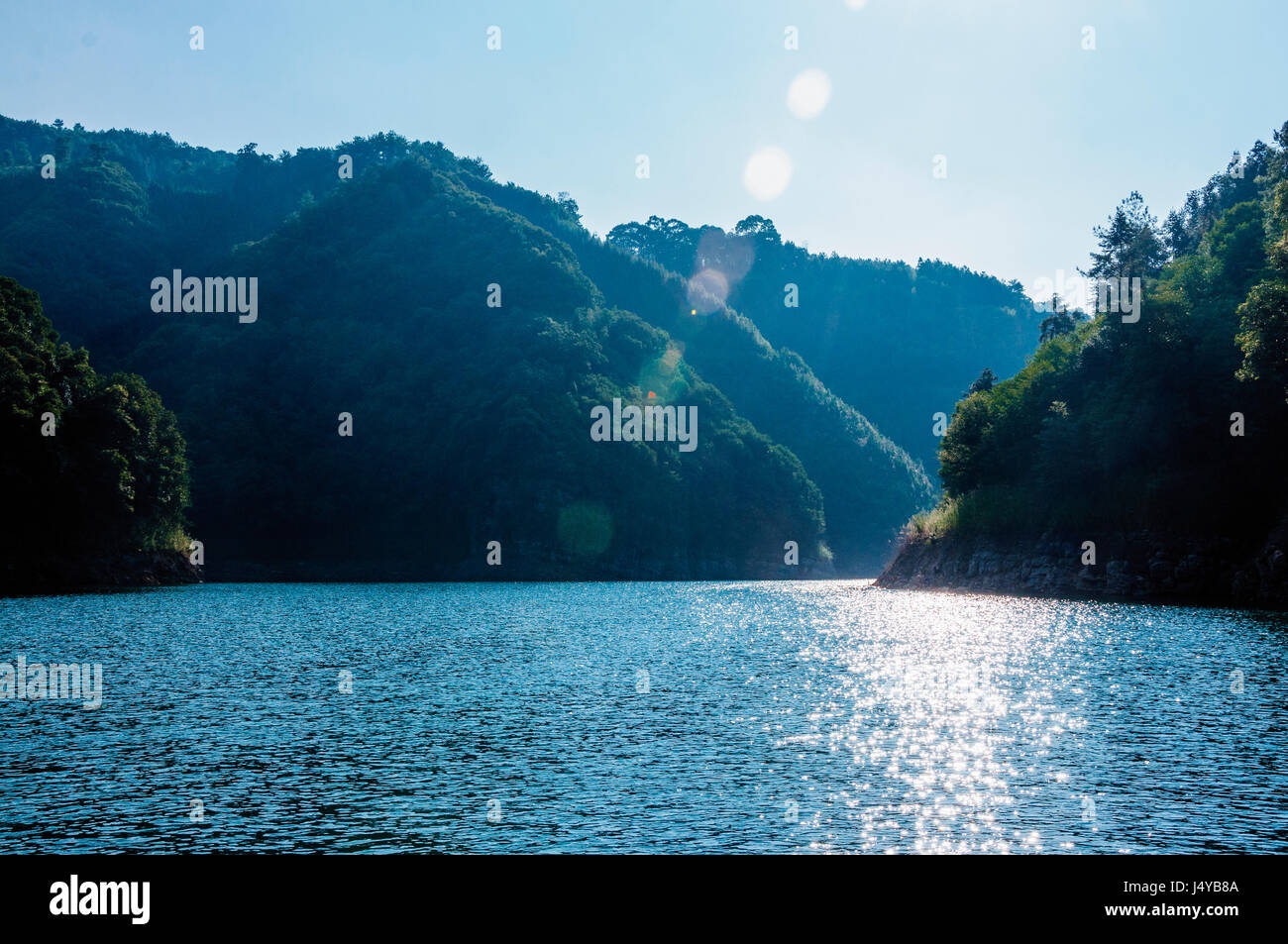 The reservoir scenery with blue sky in summer Stock Photo - Alamy