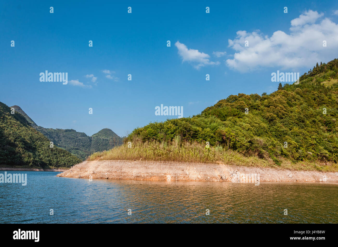 The reservoir scenery with blue sky in summer Stock Photo - Alamy