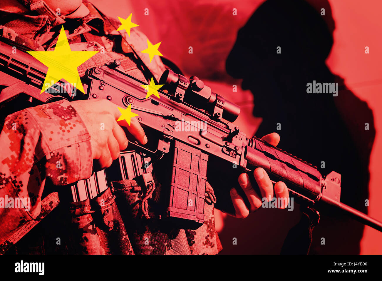 Soldier with machine gun with national flag of China Stock Photo - Alamy