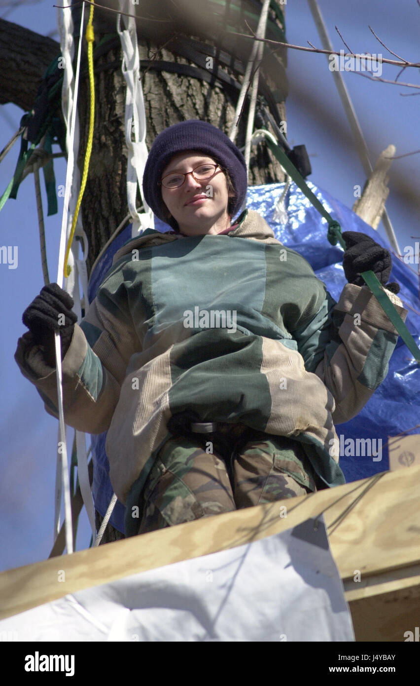 Tracy "Dolphin" McNeeley stands on a platform where she began a tree ...