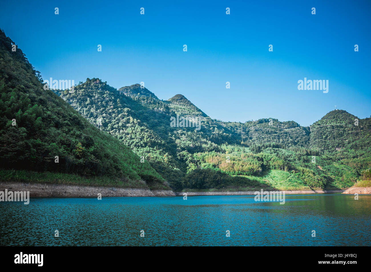 The reservoir scenery with blue sky in summer Stock Photo - Alamy