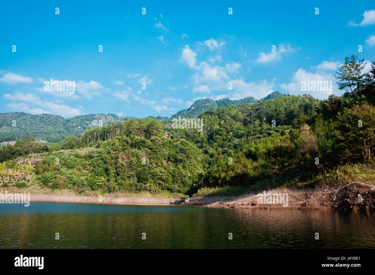The reservoir scenery with blue sky in summer Stock Photo - Alamy