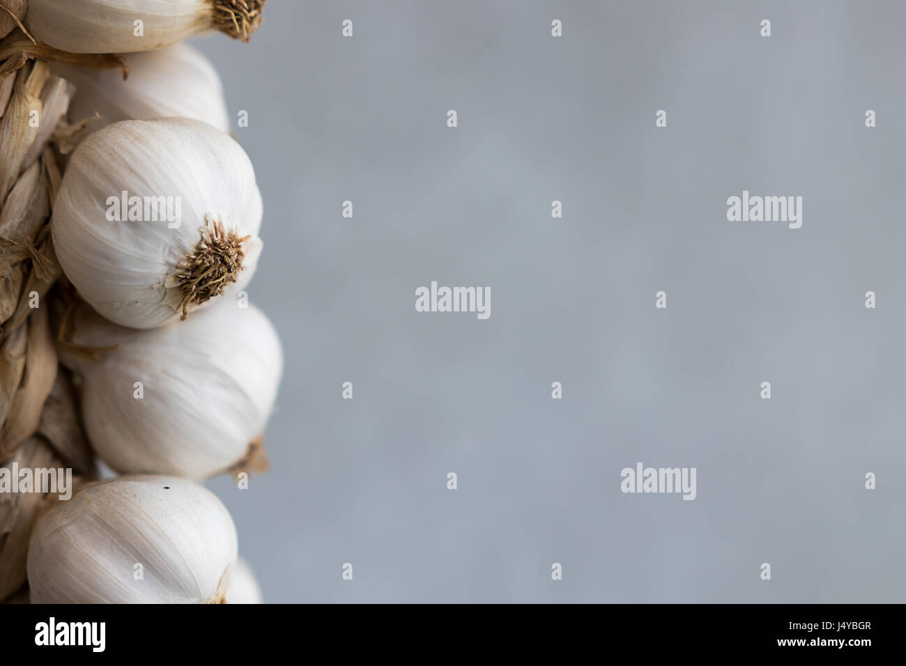 String of garlic Stock Photo - Alamy